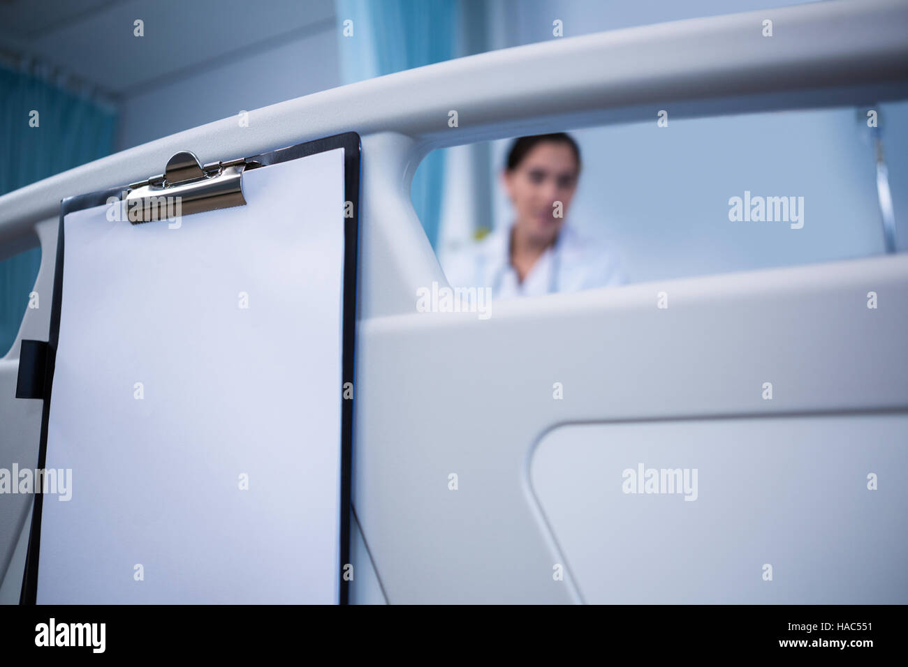 Close-up of clipboard hanging on bed Stock Photo - Alamy