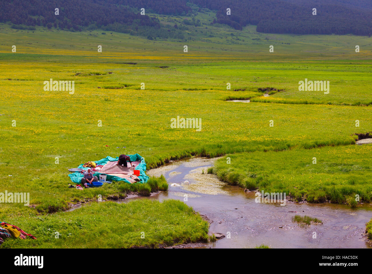 Man washing clothes river in hi-res stock photography and images - Alamy