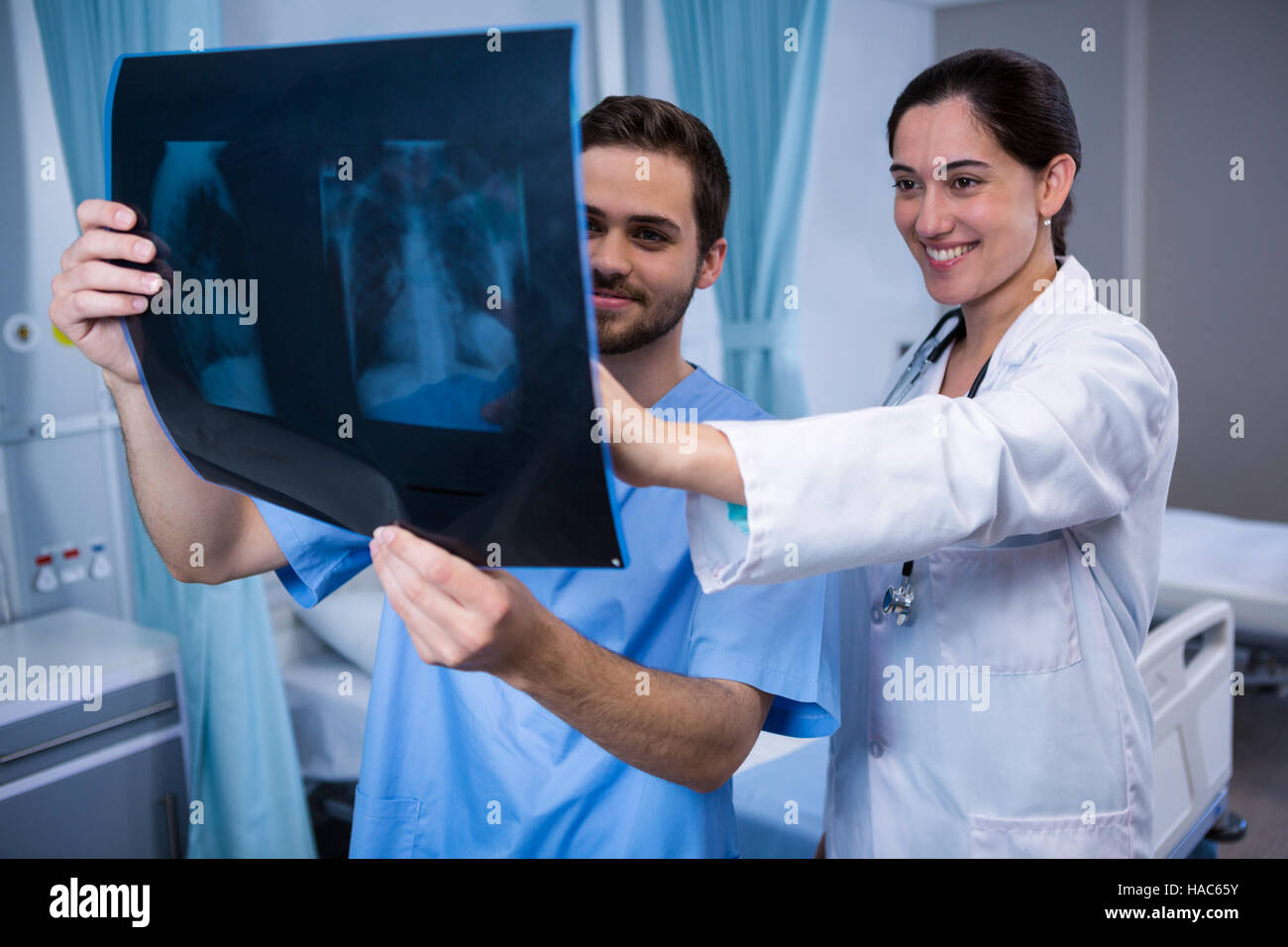 Doctors examining x-ray Stock Photo - Alamy