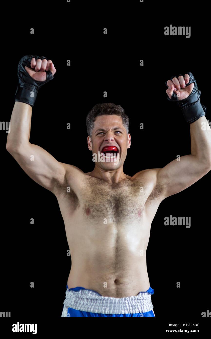 Boxer posing after victory Stock Photo - Alamy