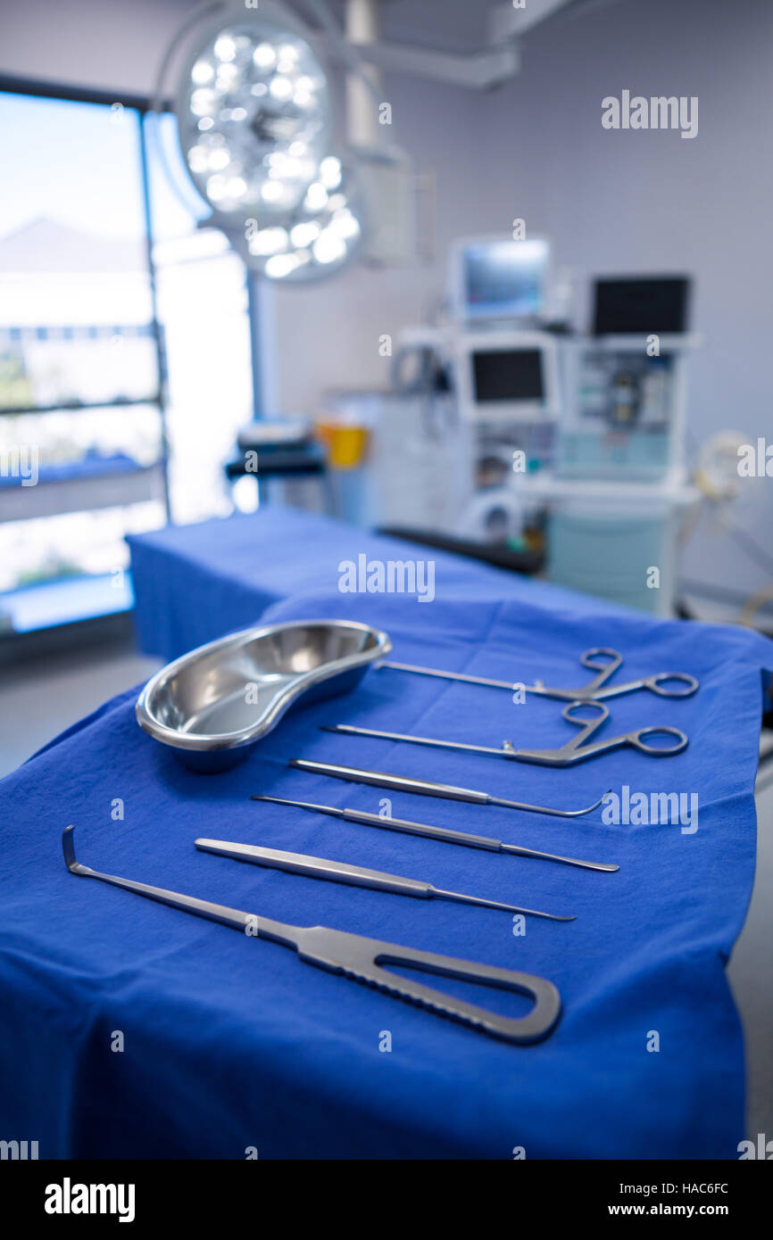 Various surgical tools kept on a table in operation theater Stock Photo ...