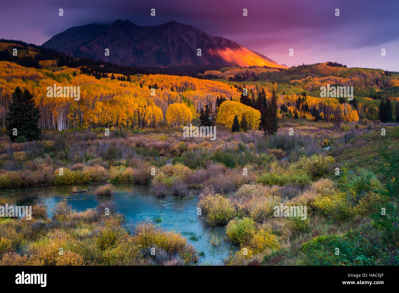 East Beckwith Mountain comes alive as the alpenglow paints the side of ...