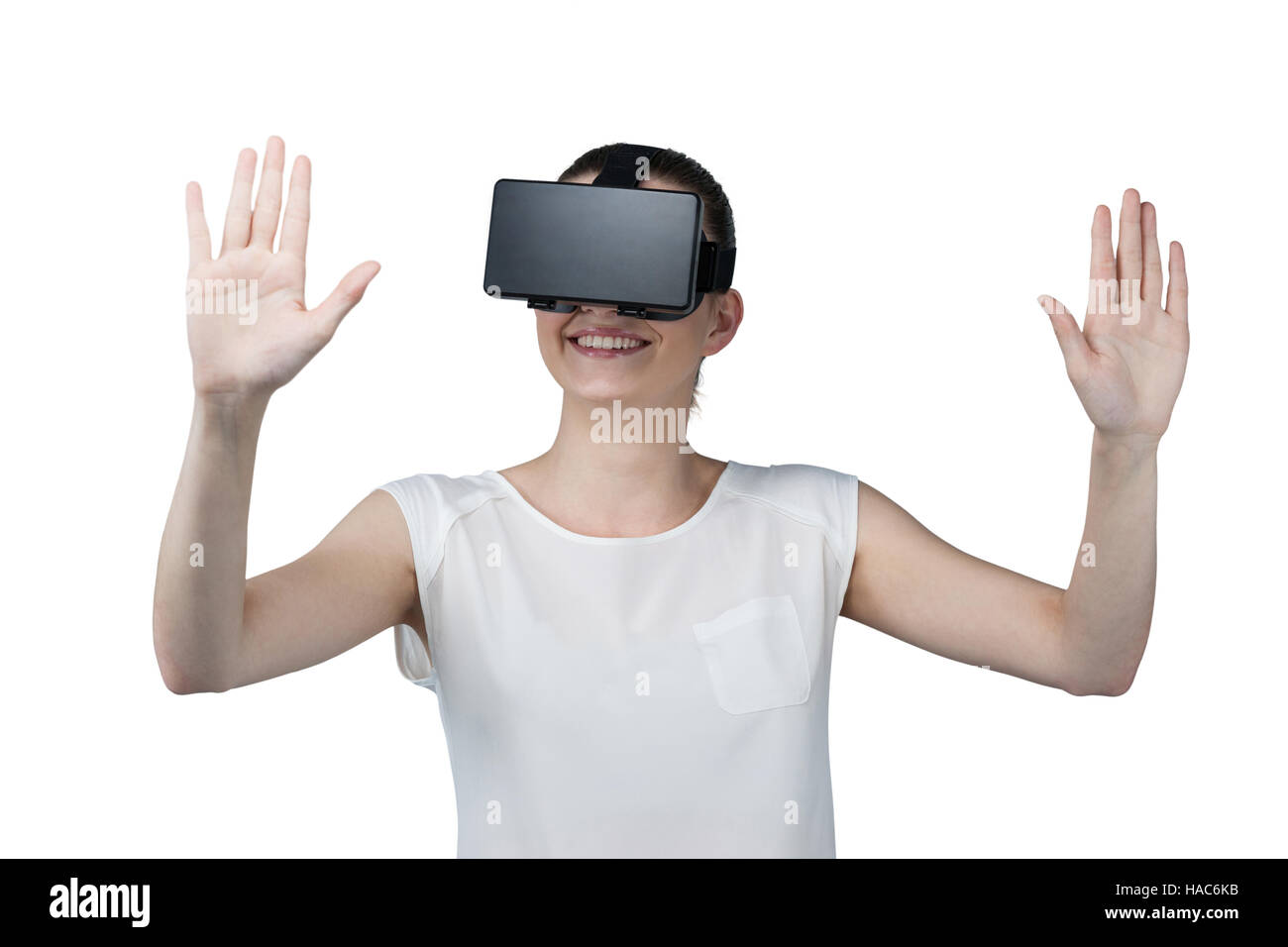 Beautiful woman using virtual reality headset Stock Photo - Alamy
