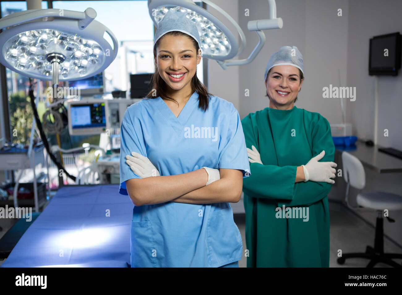 Portrait of a female surgeons standing in operation theater Stock Photo ...