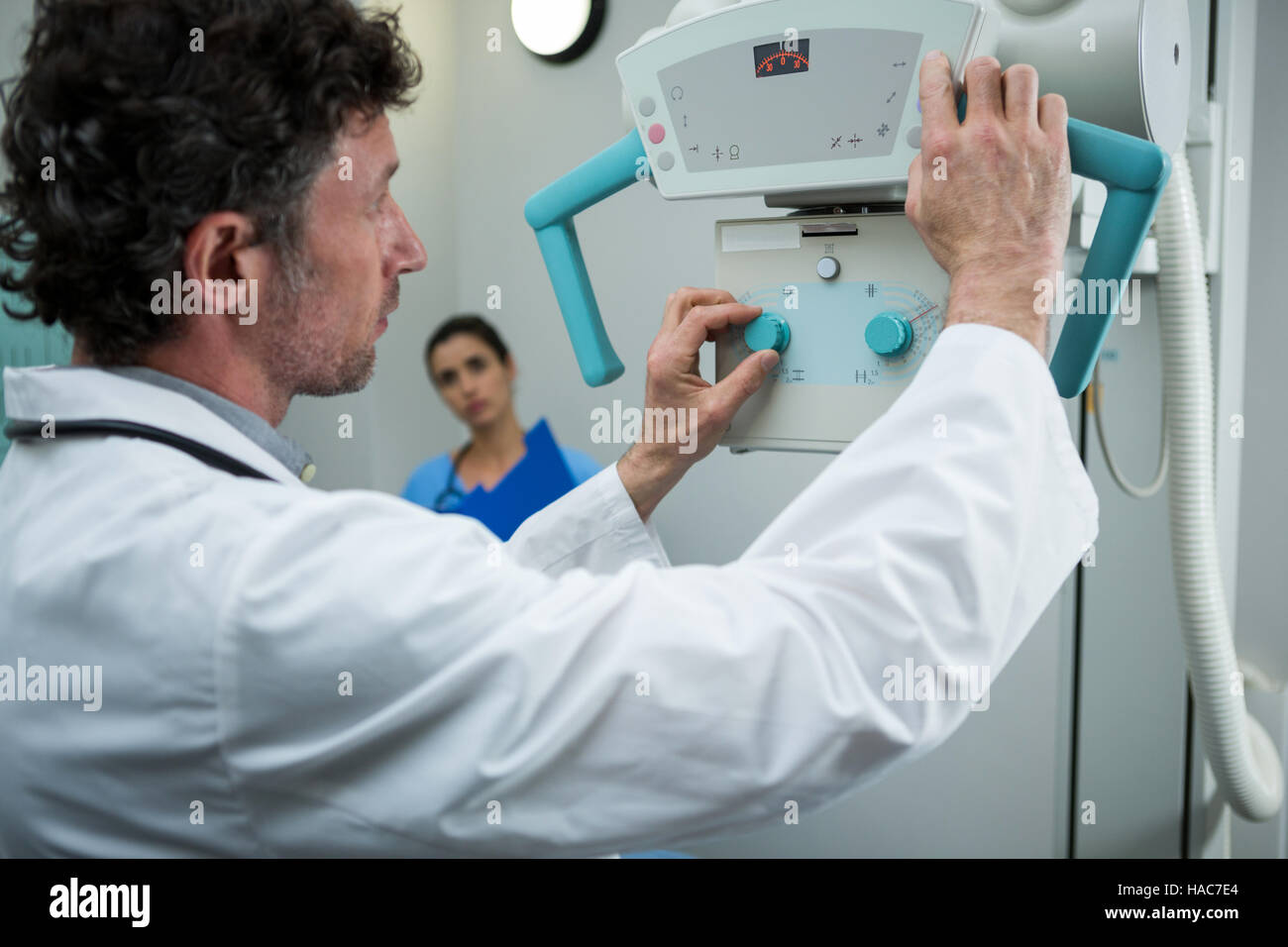 Radiologist Adjusting X Ray Machine High Resolution Stock Photography ...
