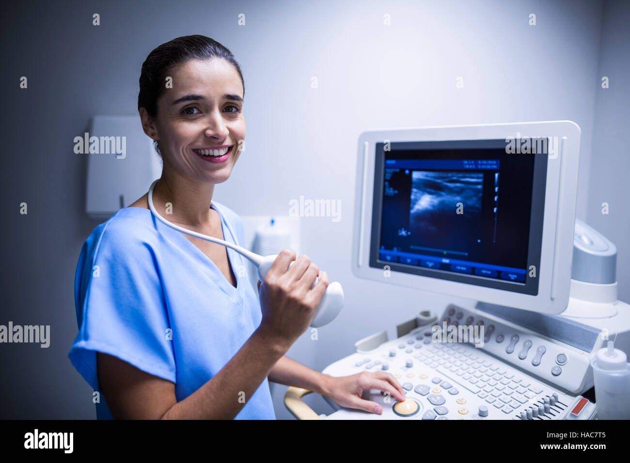 Nurse using ultrasonic device Stock Photo - Alamy