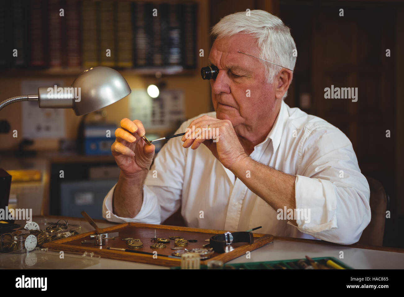 Horologist repairing a watch Stock Photo - Alamy