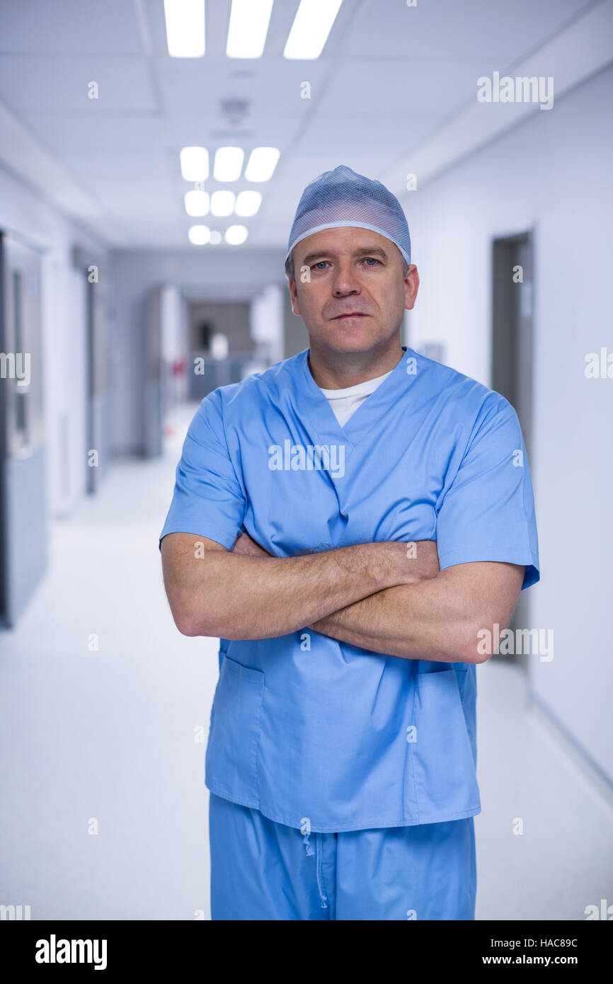 Portrait of male surgeon standing with arms crossed Stock Photo - Alamy