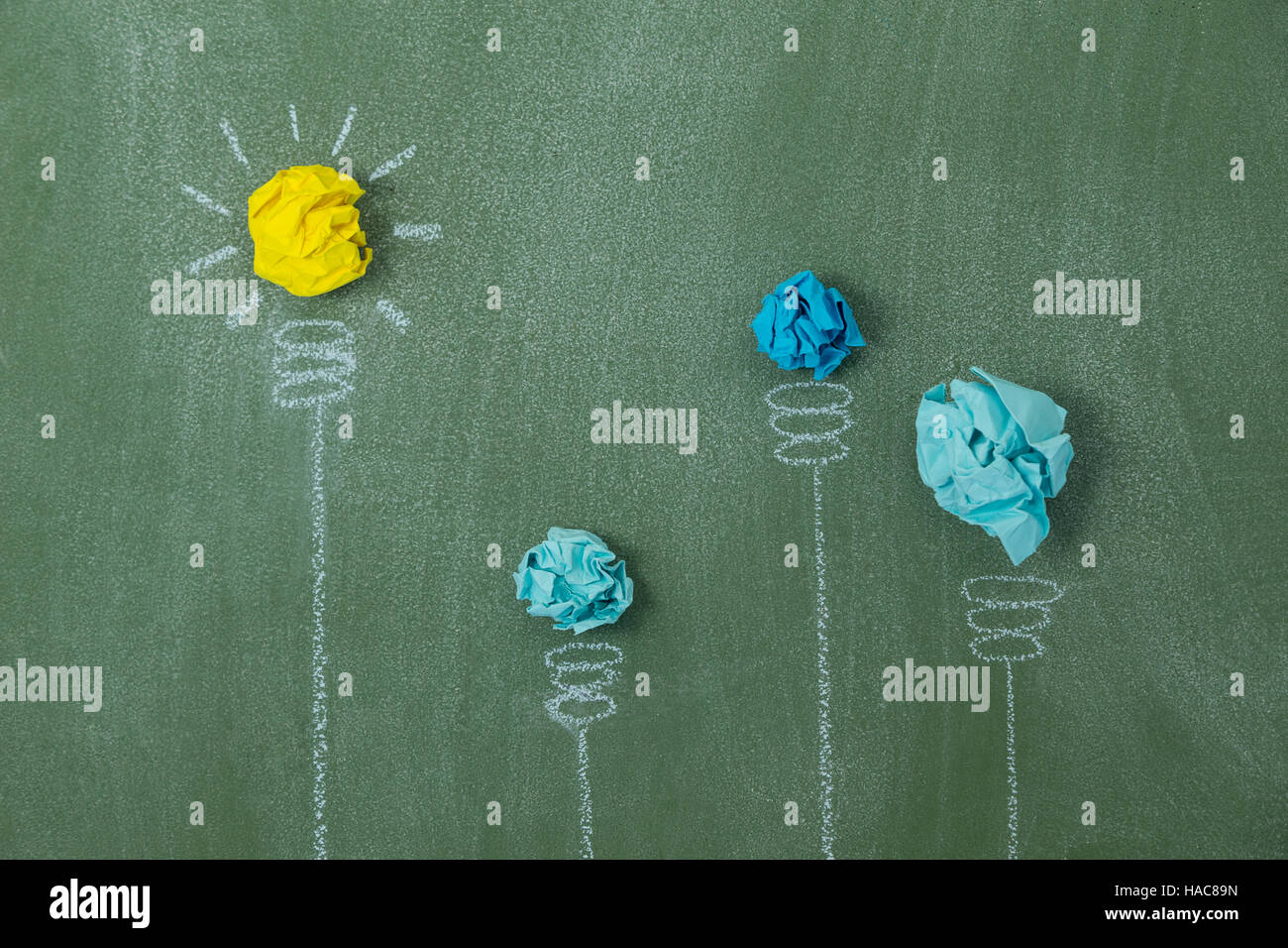 Light bulb created with crumpled paper balls Stock Photo - Alamy