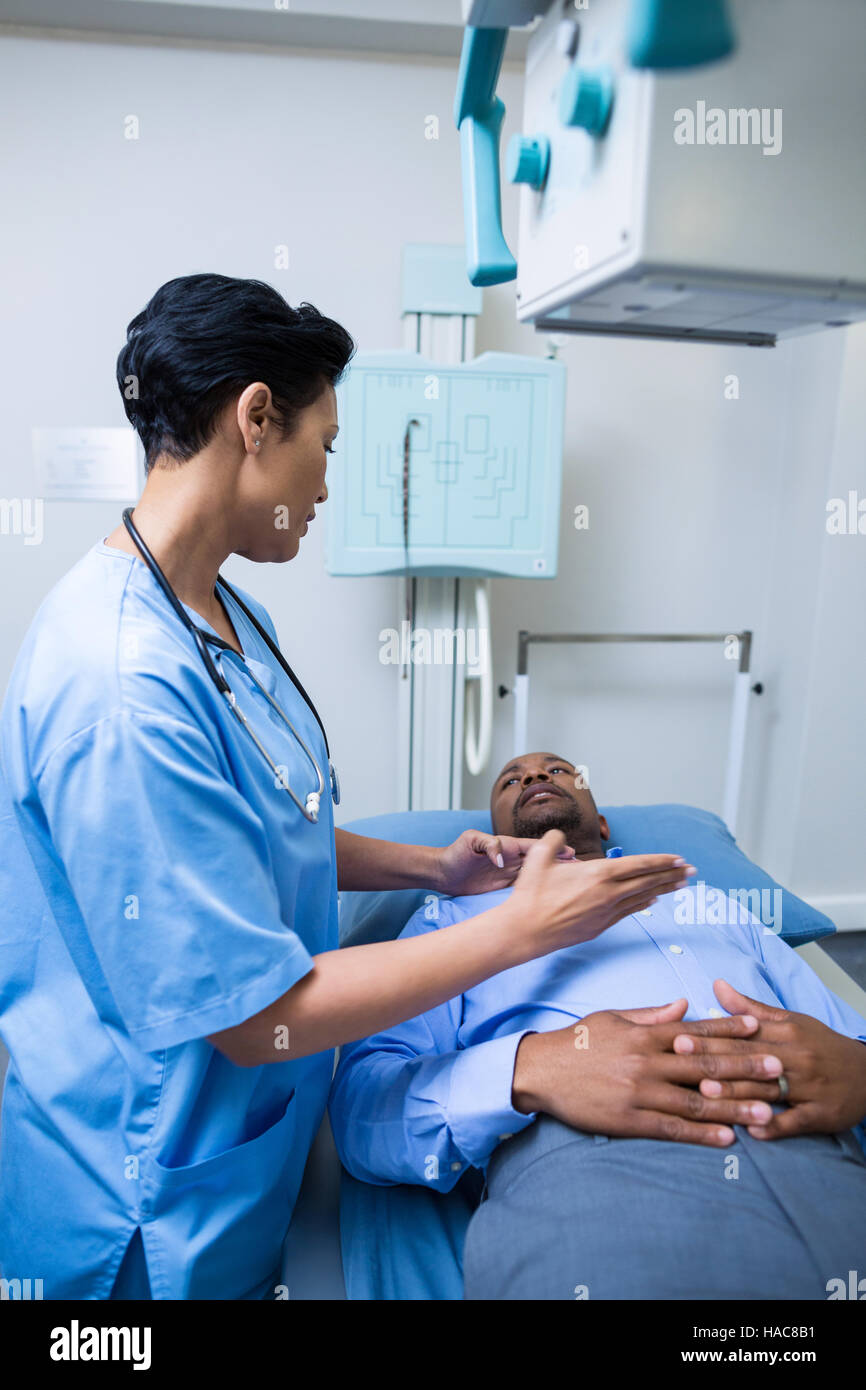 Nurse examine patient Stock Photo - Alamy