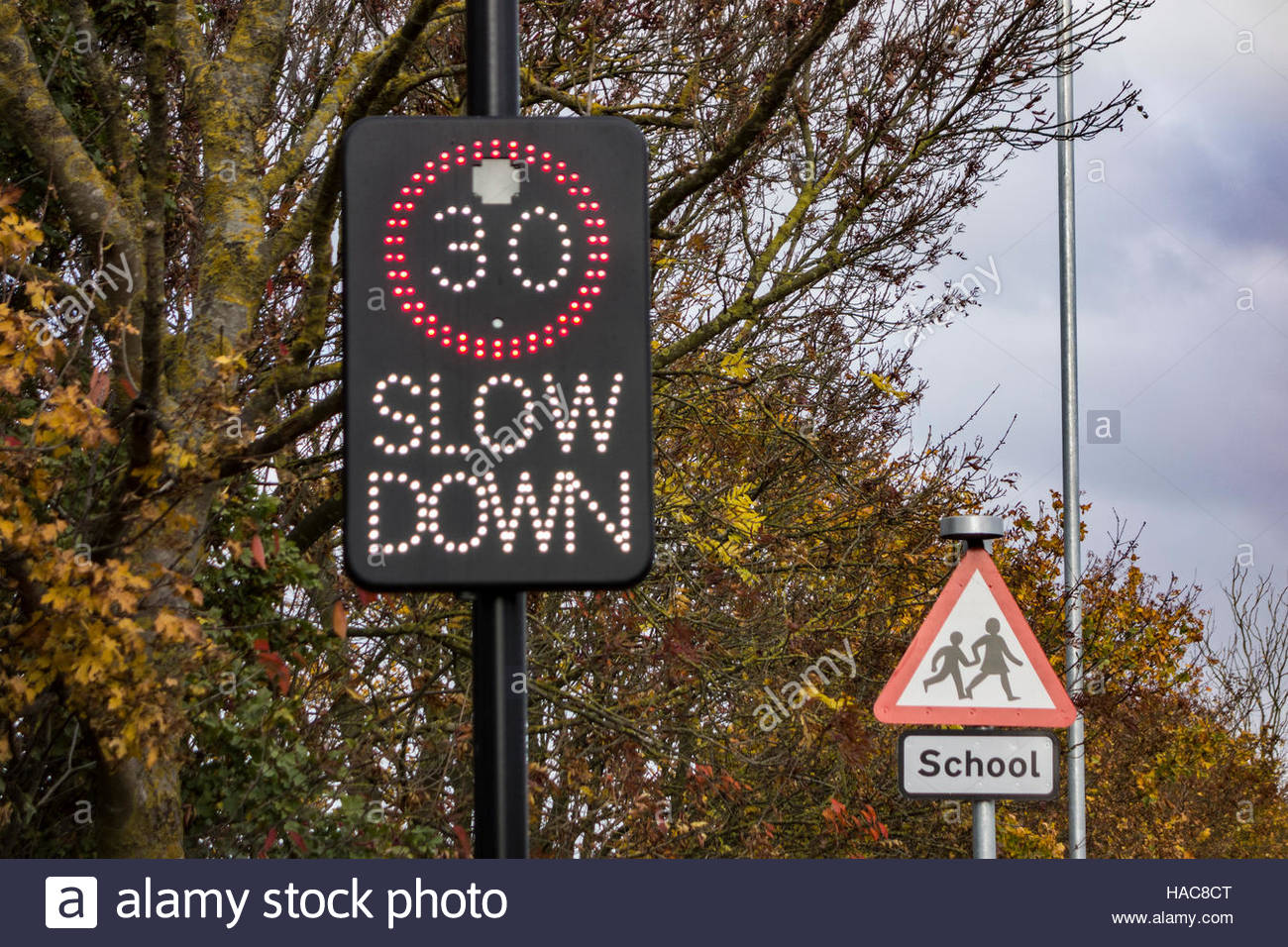 Slow Down Warning Road Sign High Resolution Stock Photography and ...