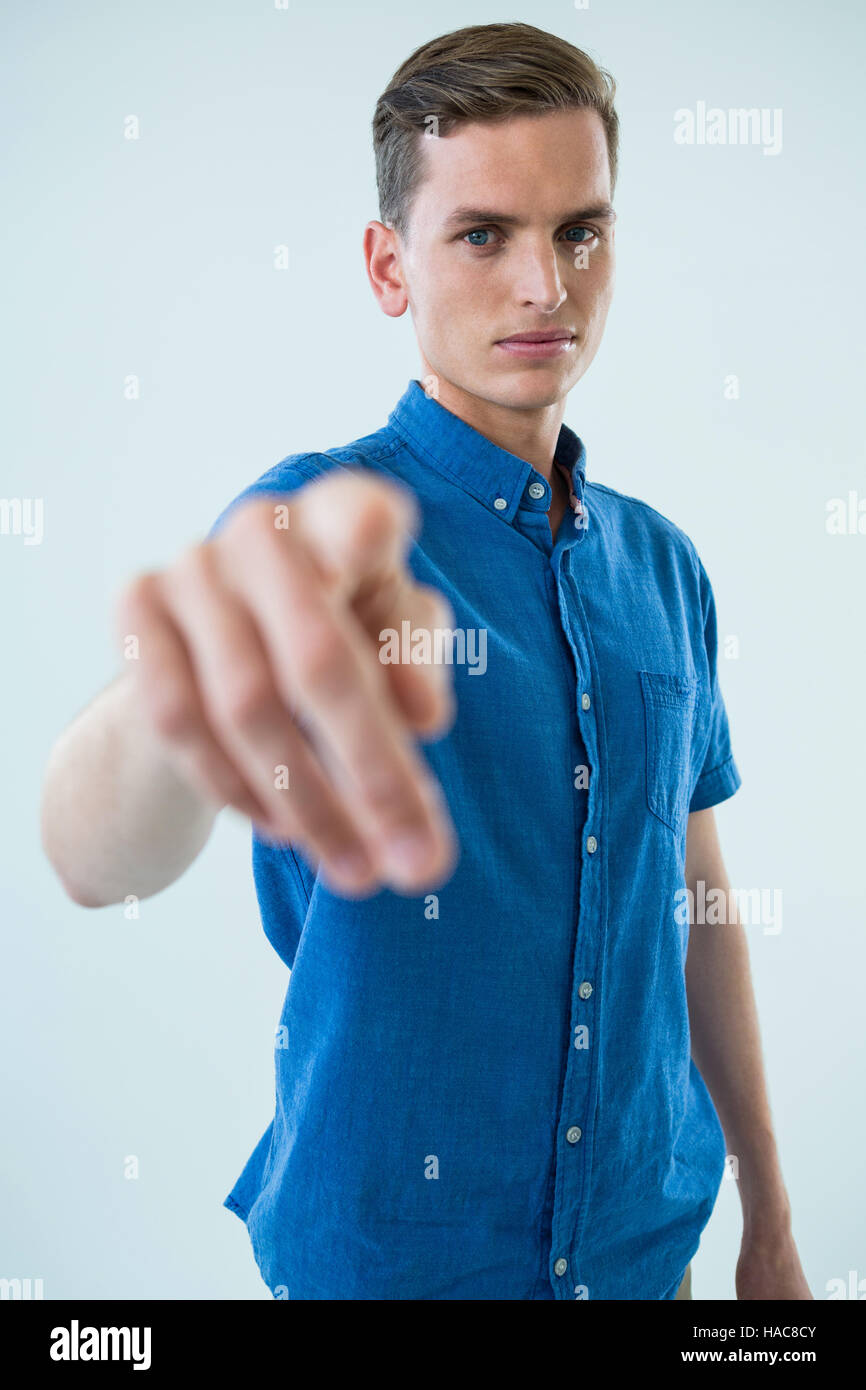 Man touching an invisible screen Stock Photo - Alamy