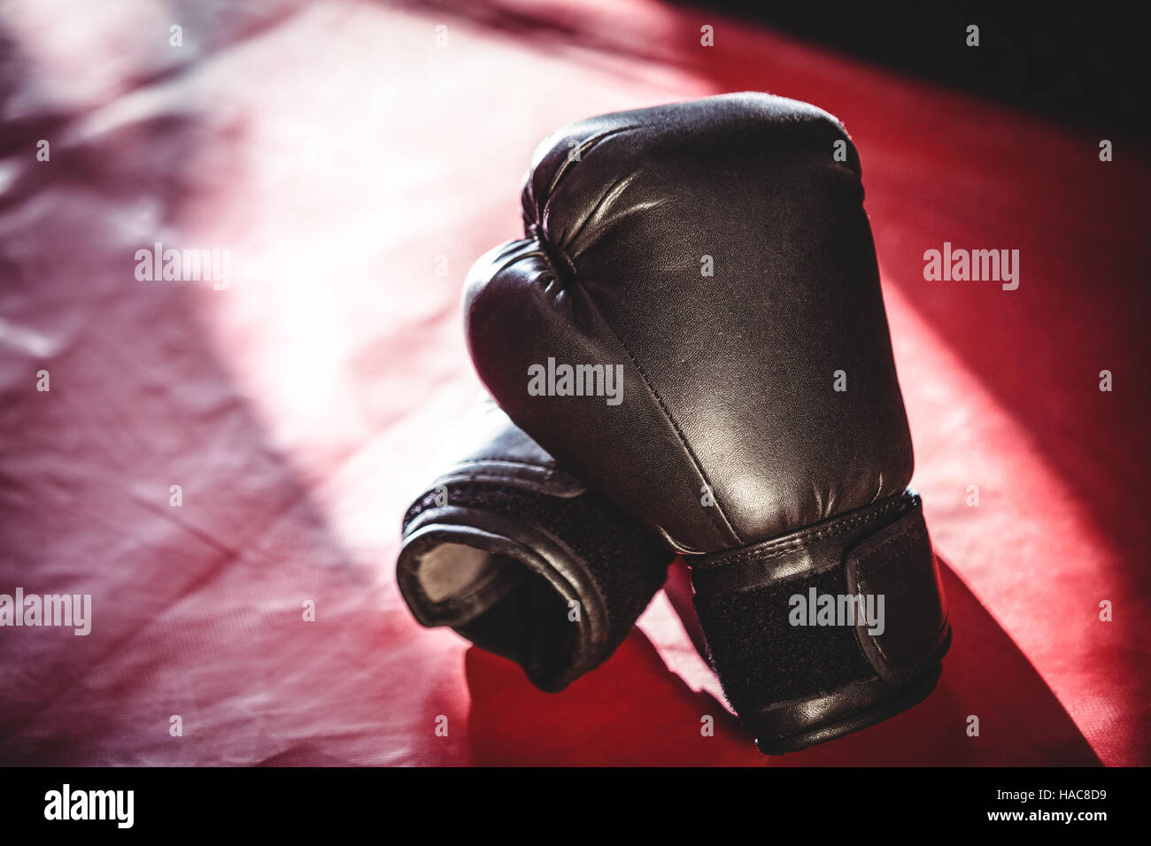 Pair of black boxing gloves Stock Photo - Alamy