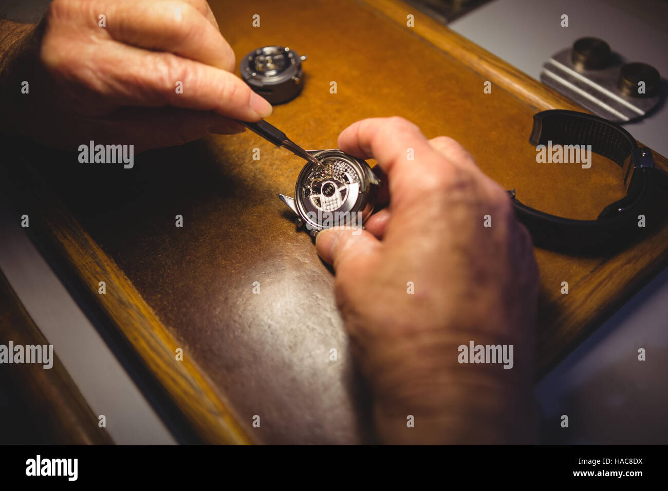 Horologist repairing a watch Stock Photo - Alamy