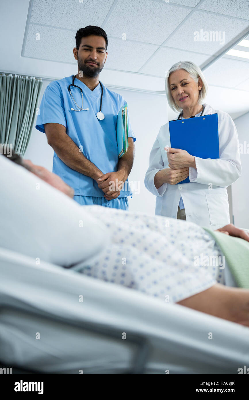 Portrait of doctor patient and smiling Stock Photo - Alamy