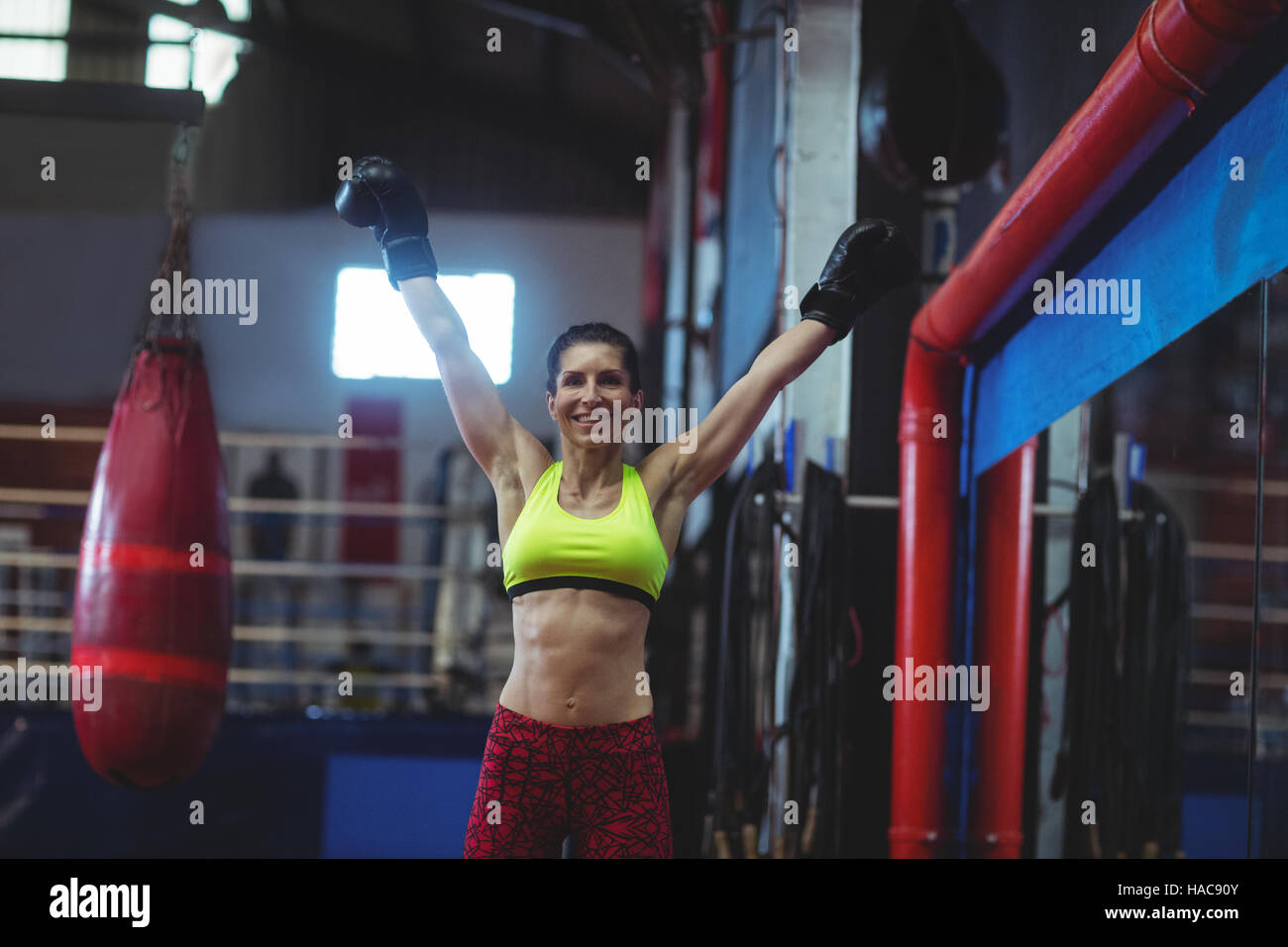 Excited female boxer posing after victory Stock Photo - Alamy