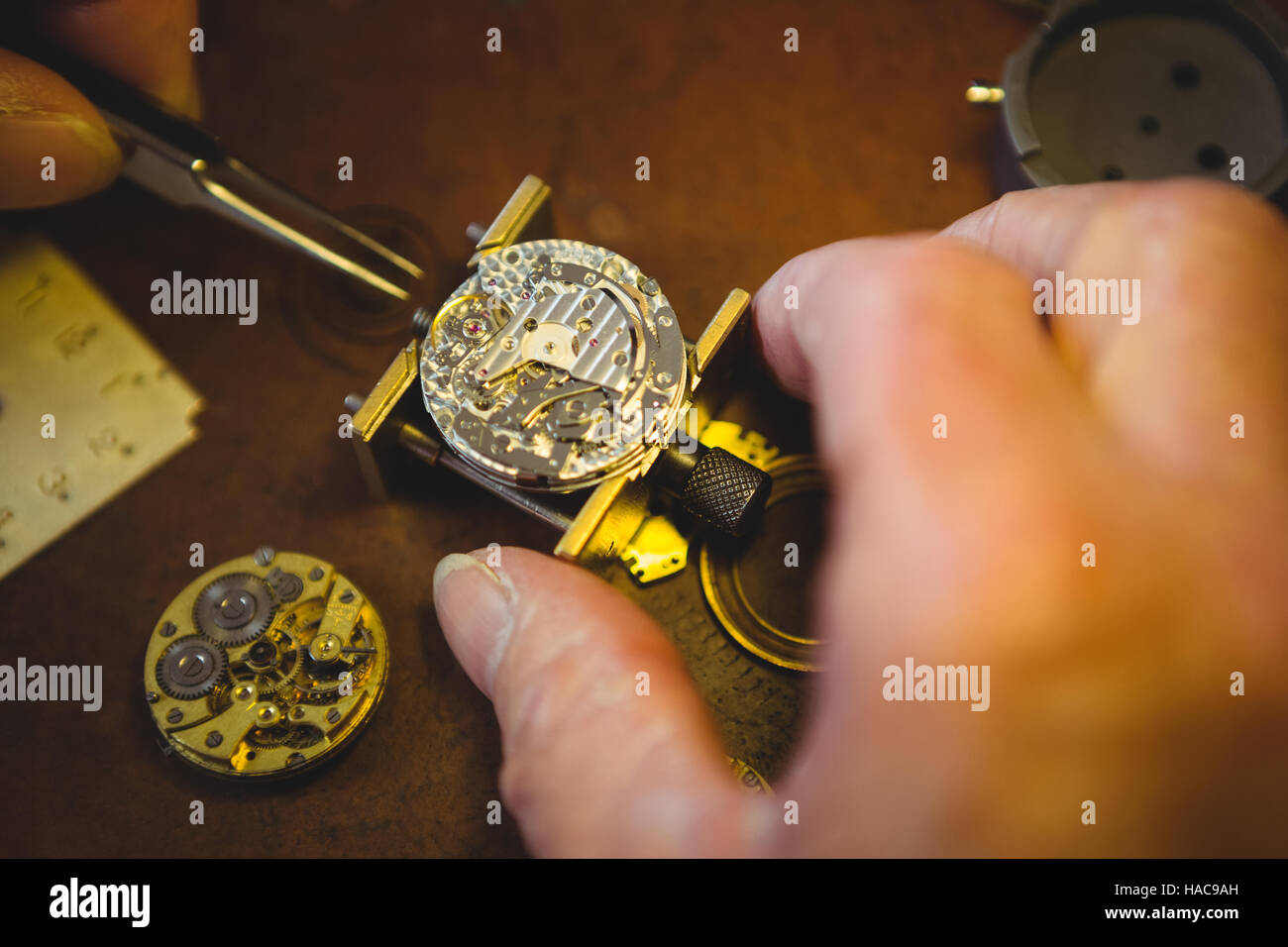 Horologist repairing a watch Stock Photo - Alamy