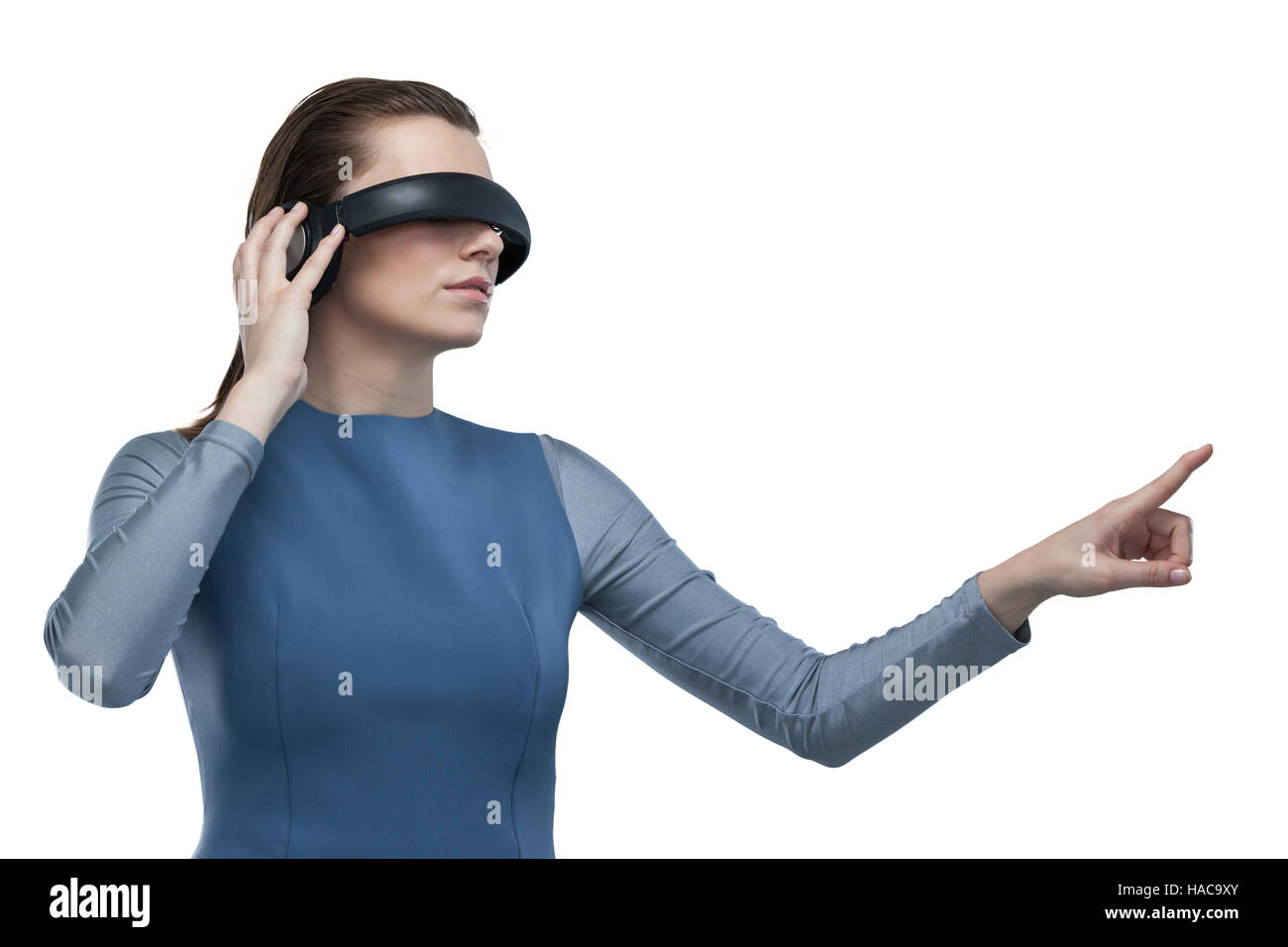 Beautiful woman using virtual reality headset using digital screen ...