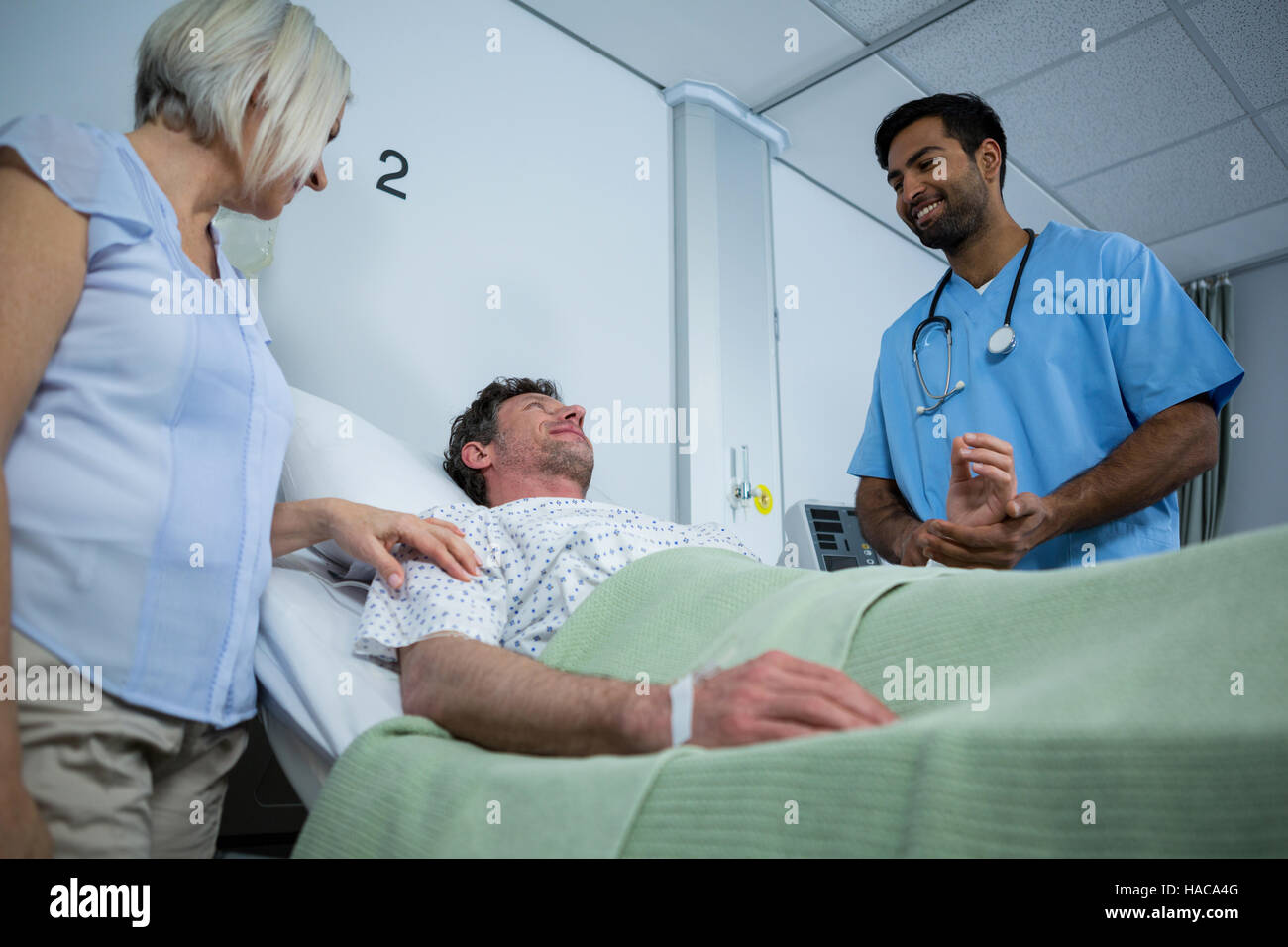 Smiling doctors interacting with each other Stock Photo - Alamy