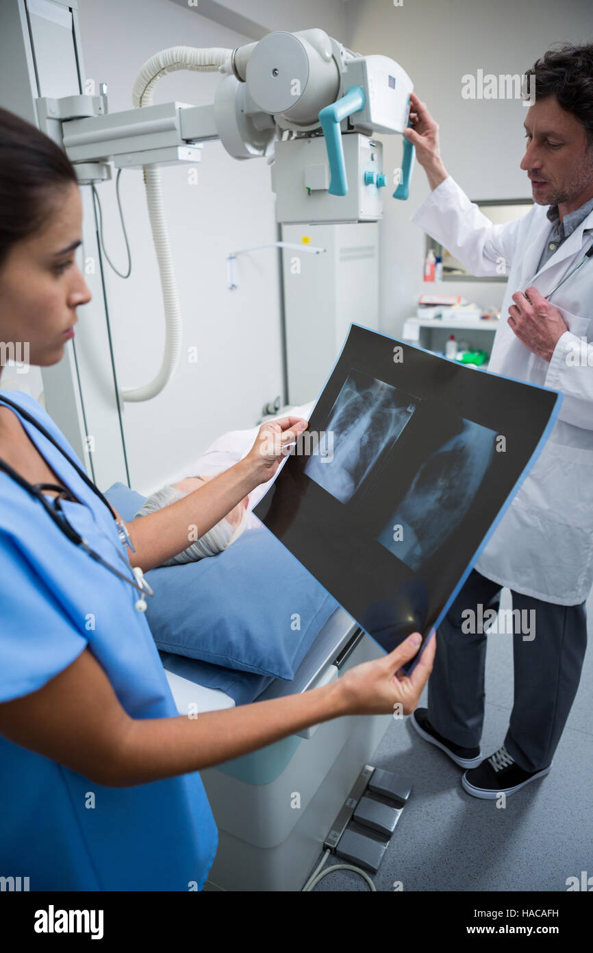 Doctor examining a x-ray Stock Photo - Alamy