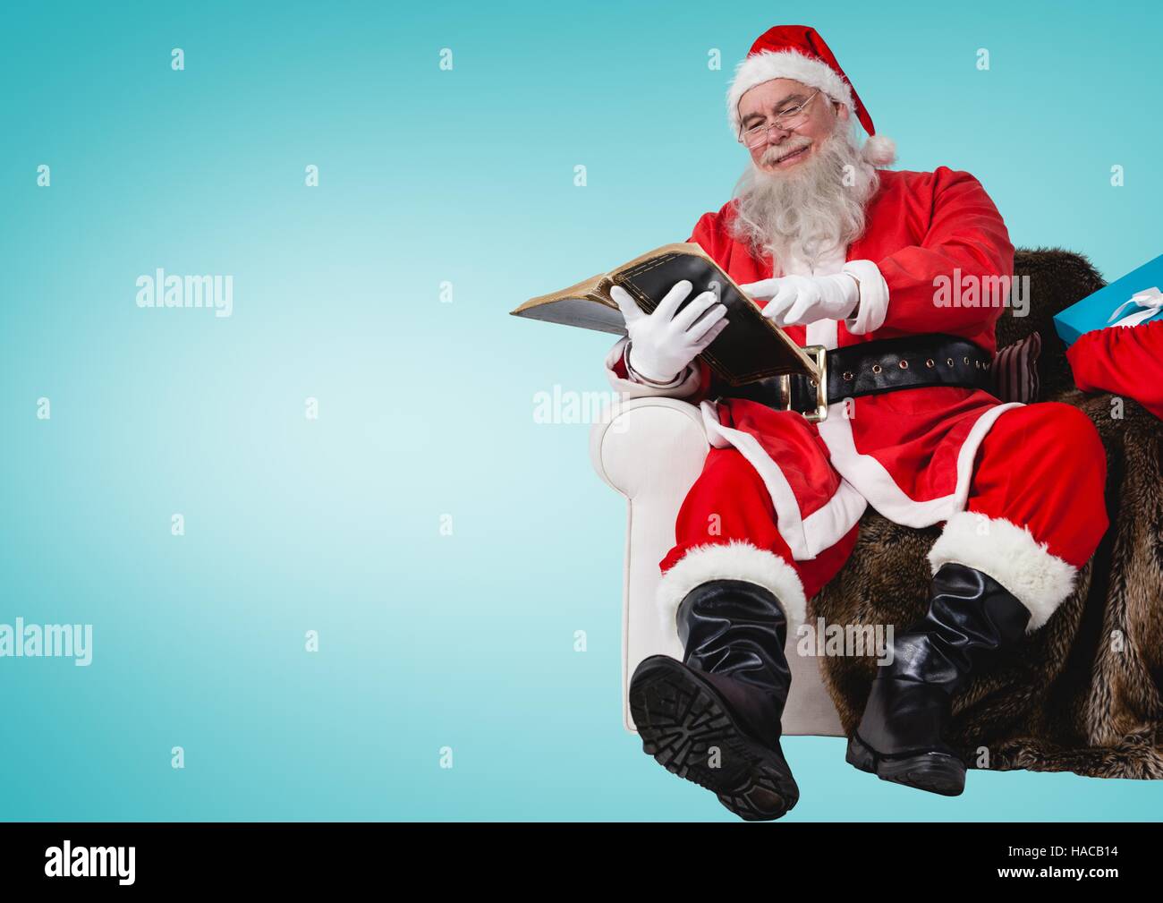 Santa Reading Book High Resolution Stock Photography and Images - Alamy