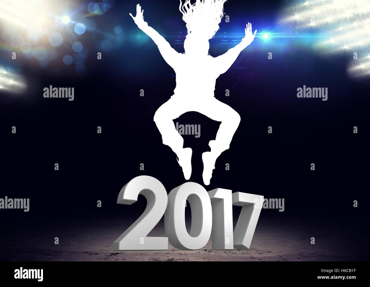 Silhouette of person jumping over 3D 2017 new year sign Stock Photo - Alamy
