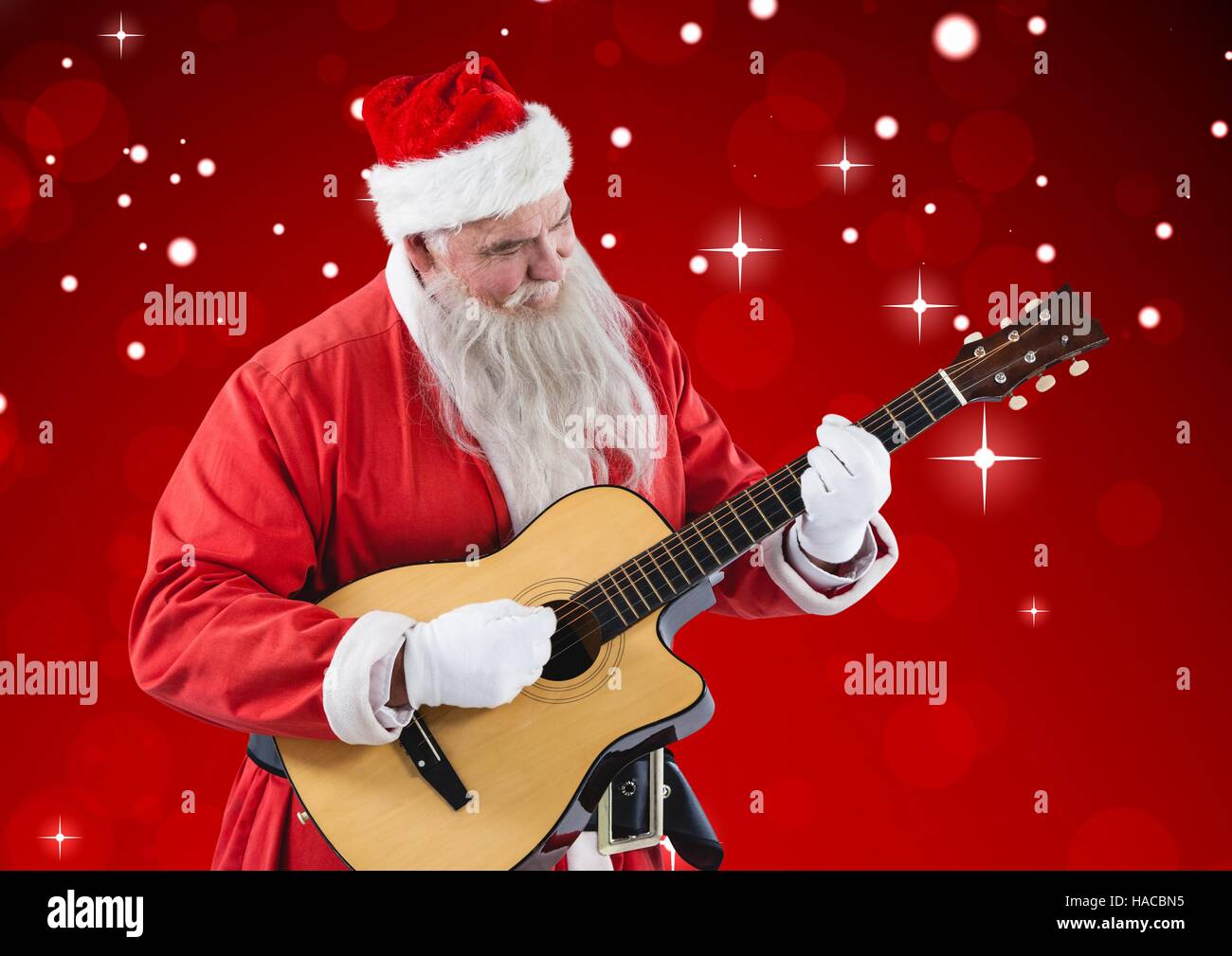 Santa claus playing guitar Stock Photo - Alamy