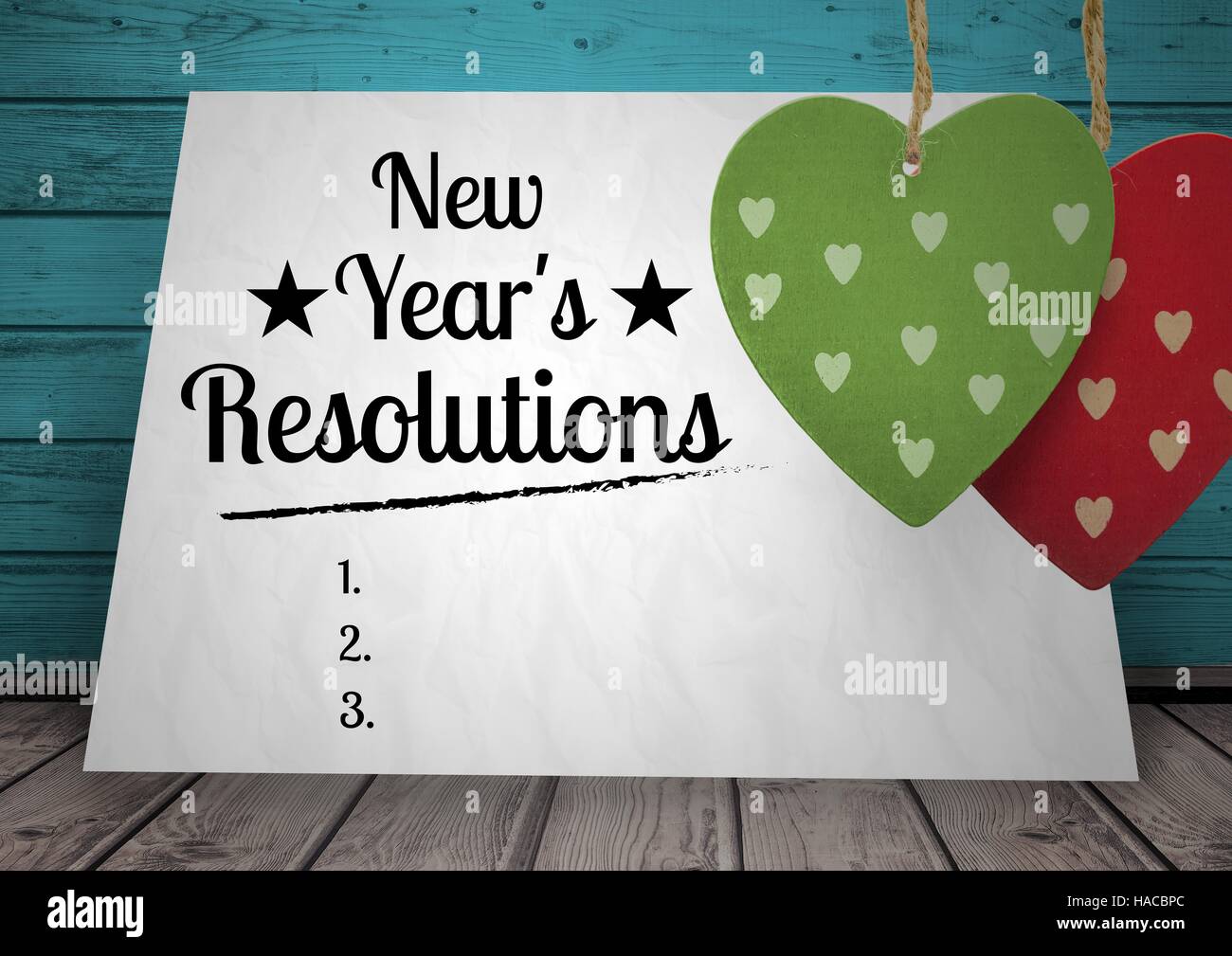 New year resolution goals written on card against wooden background ...