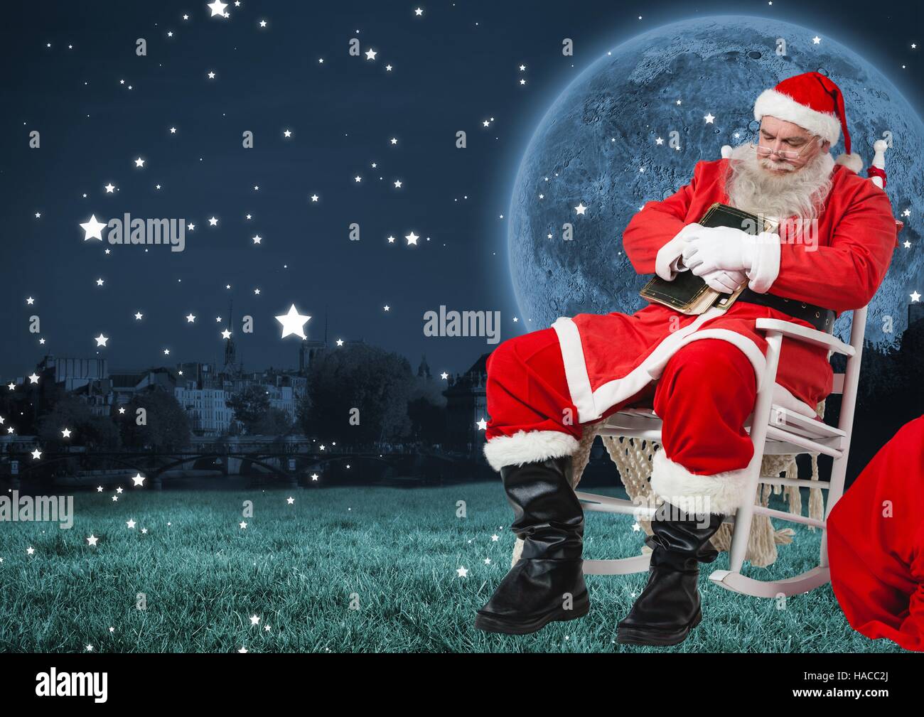 Santa sitting on chair and sleeping Stock Photo - Alamy