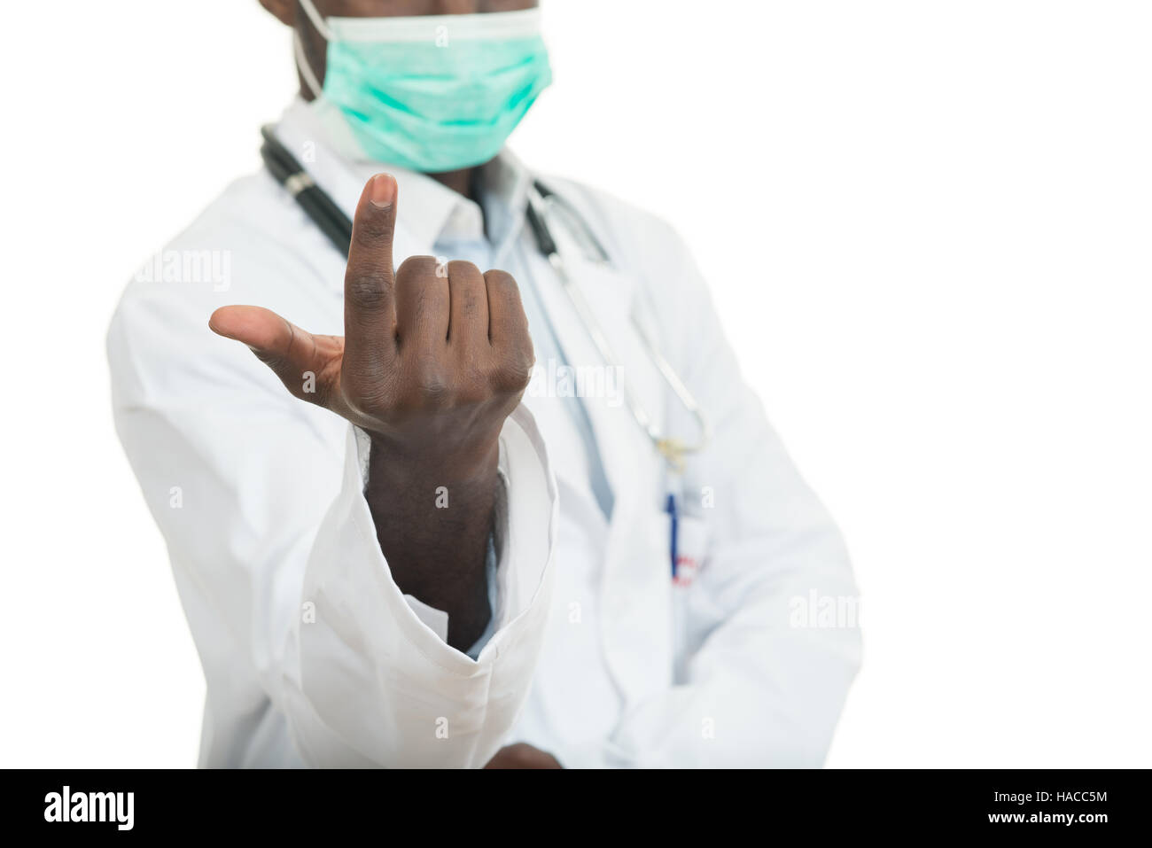 Confident male doctor. Cheerful African doctor pointing with finger ...