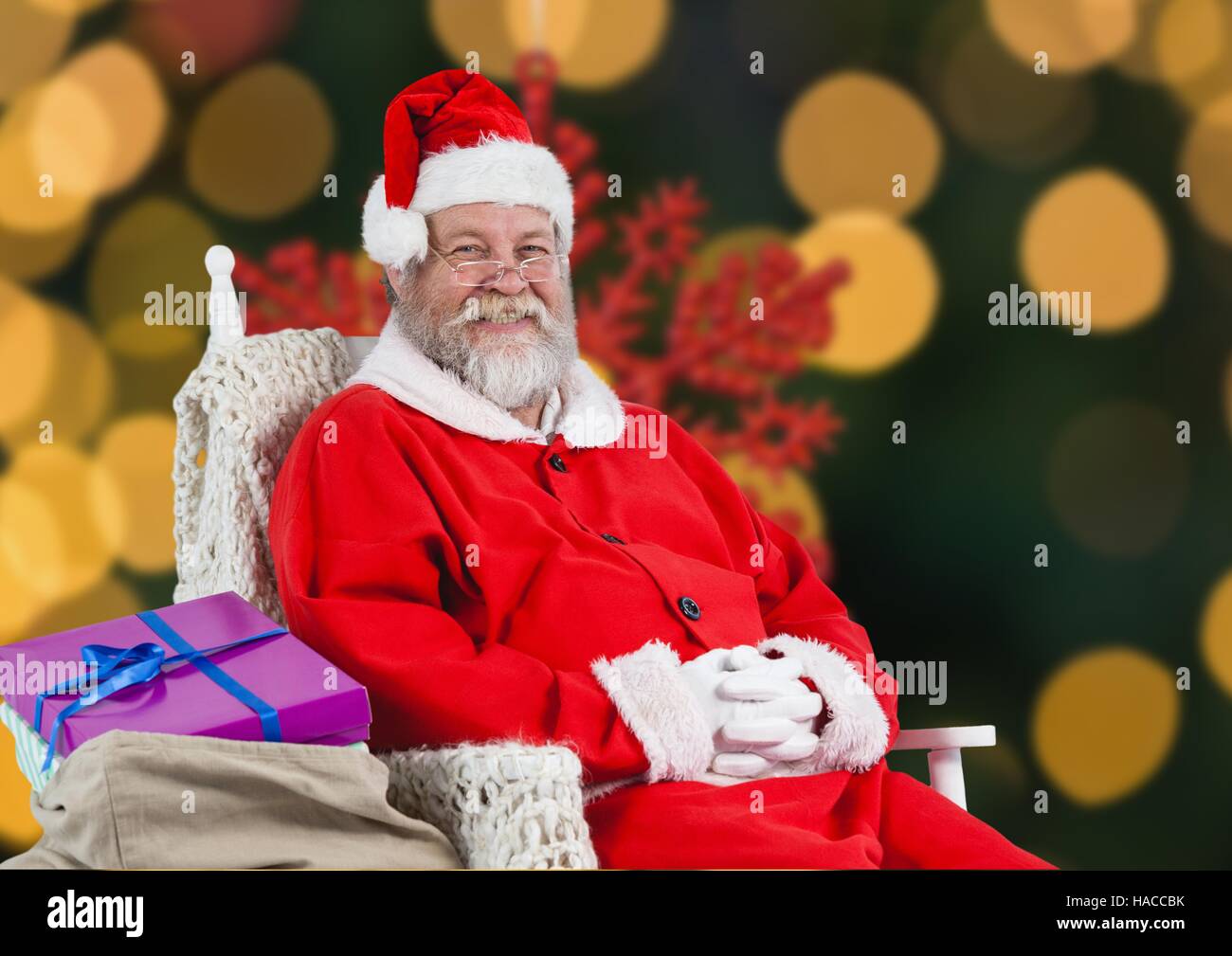 Santa claus sitting on a chair hi-res stock photography and images - Alamy
