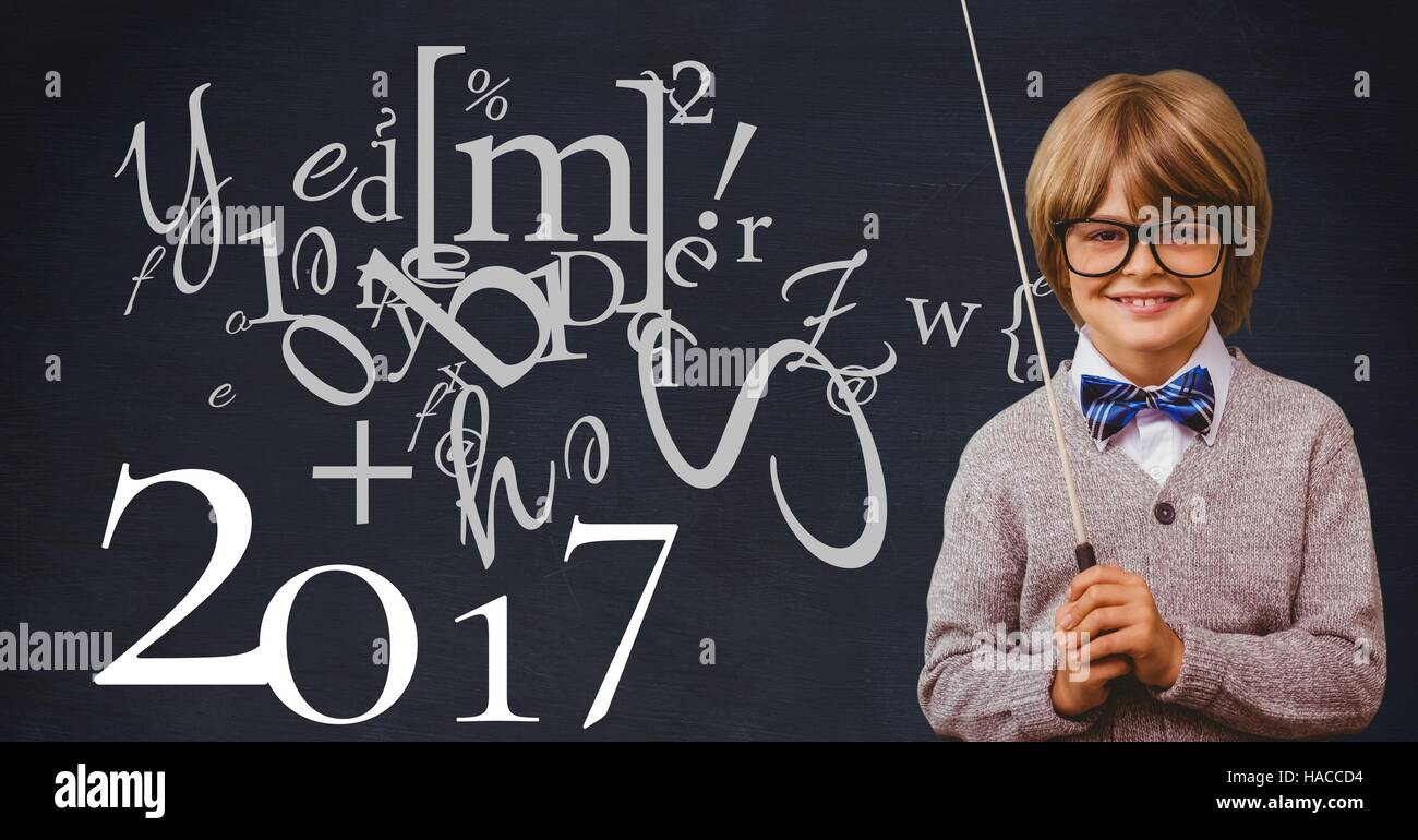 Smiling boy with stick standing next to happy new year wishes Stock ...