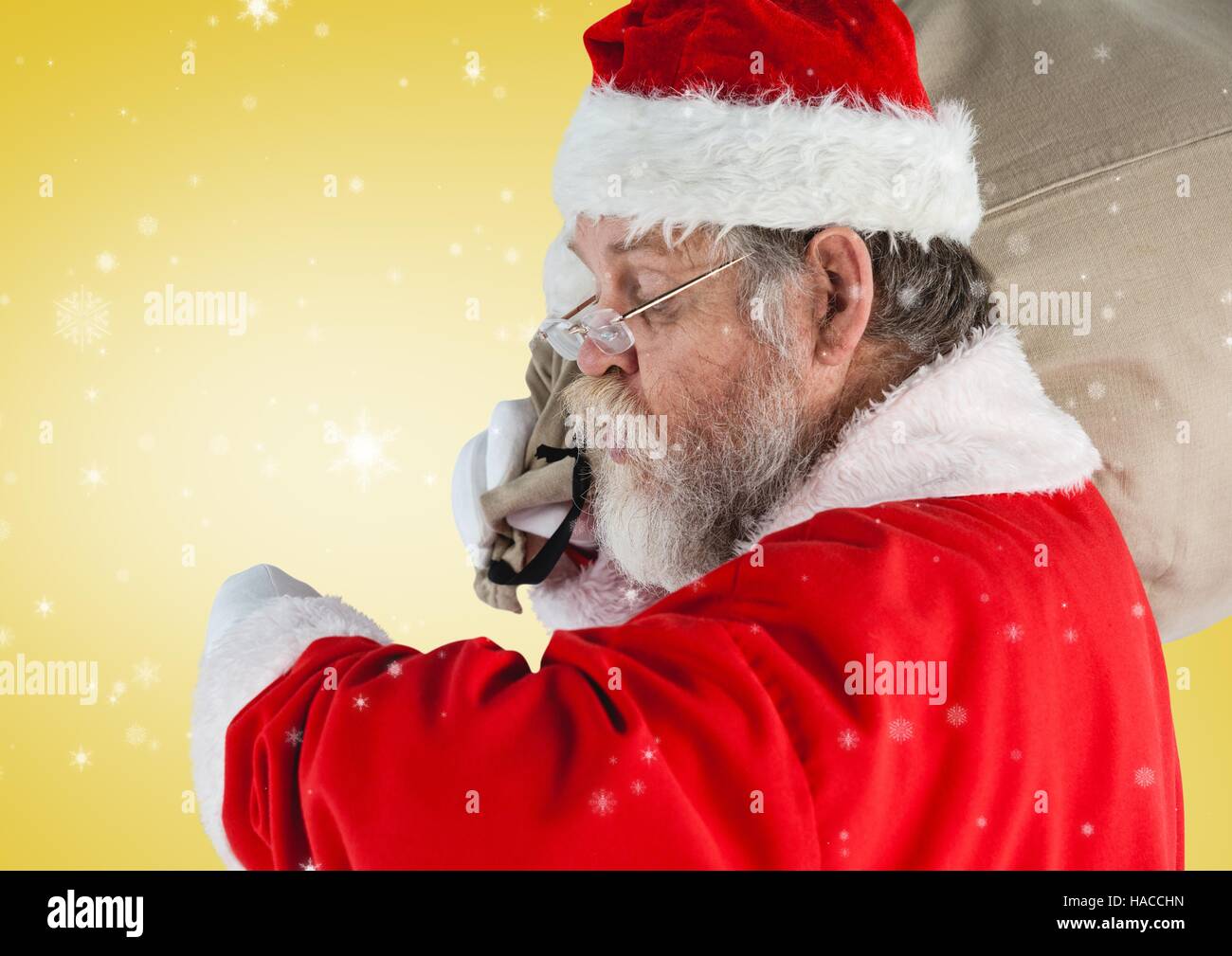 Santa checking the time Stock Photo - Alamy