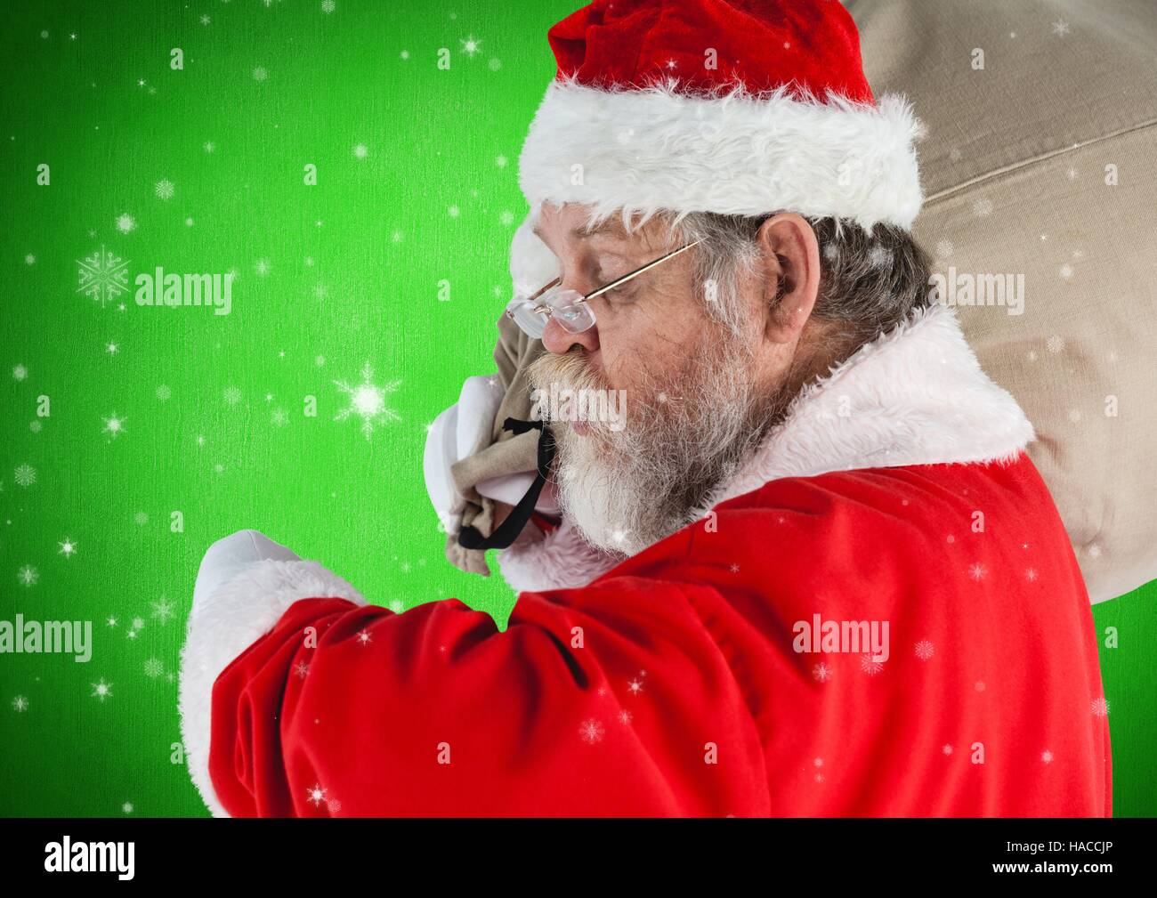 Santa checking the time Stock Photo - Alamy