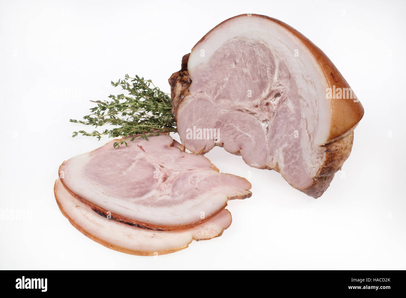 Pieces of ham on an isolated studio background Stock Photo - Alamy