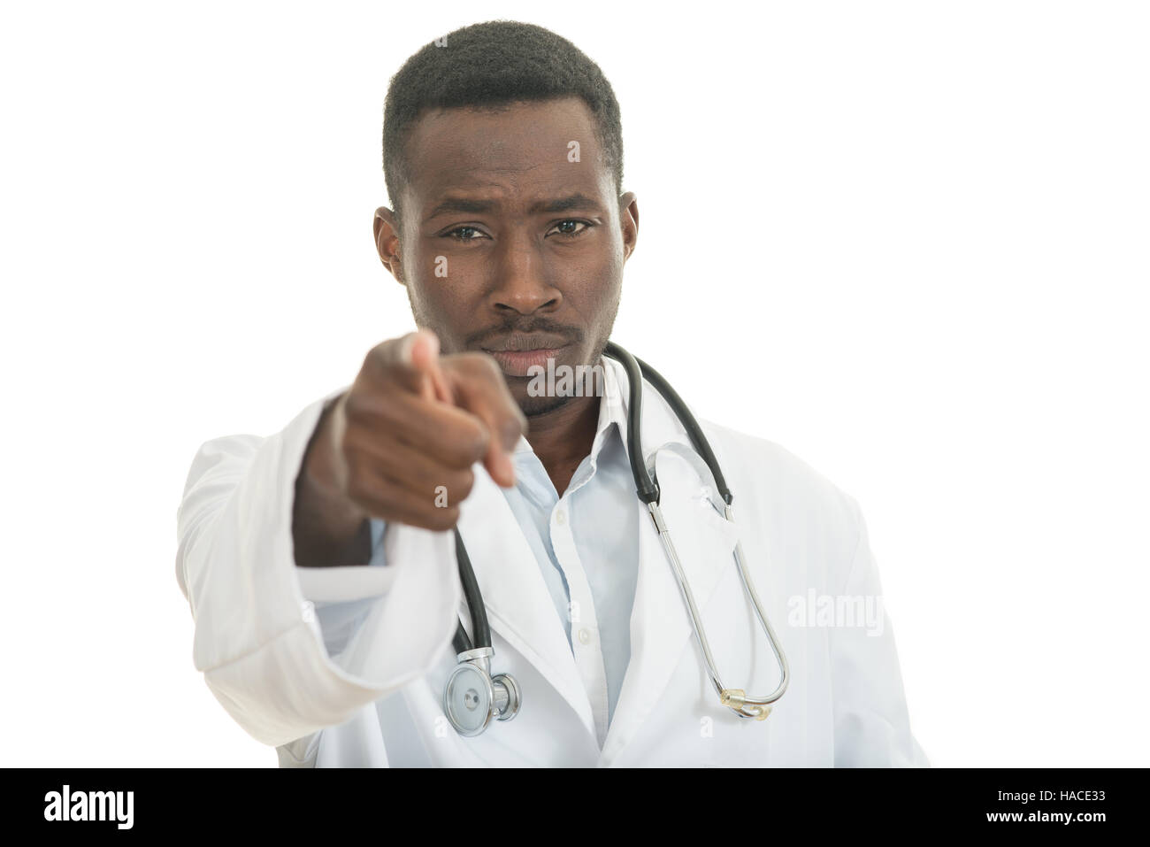 Angry african black male doctor pointing finger at you with stethoscope ...