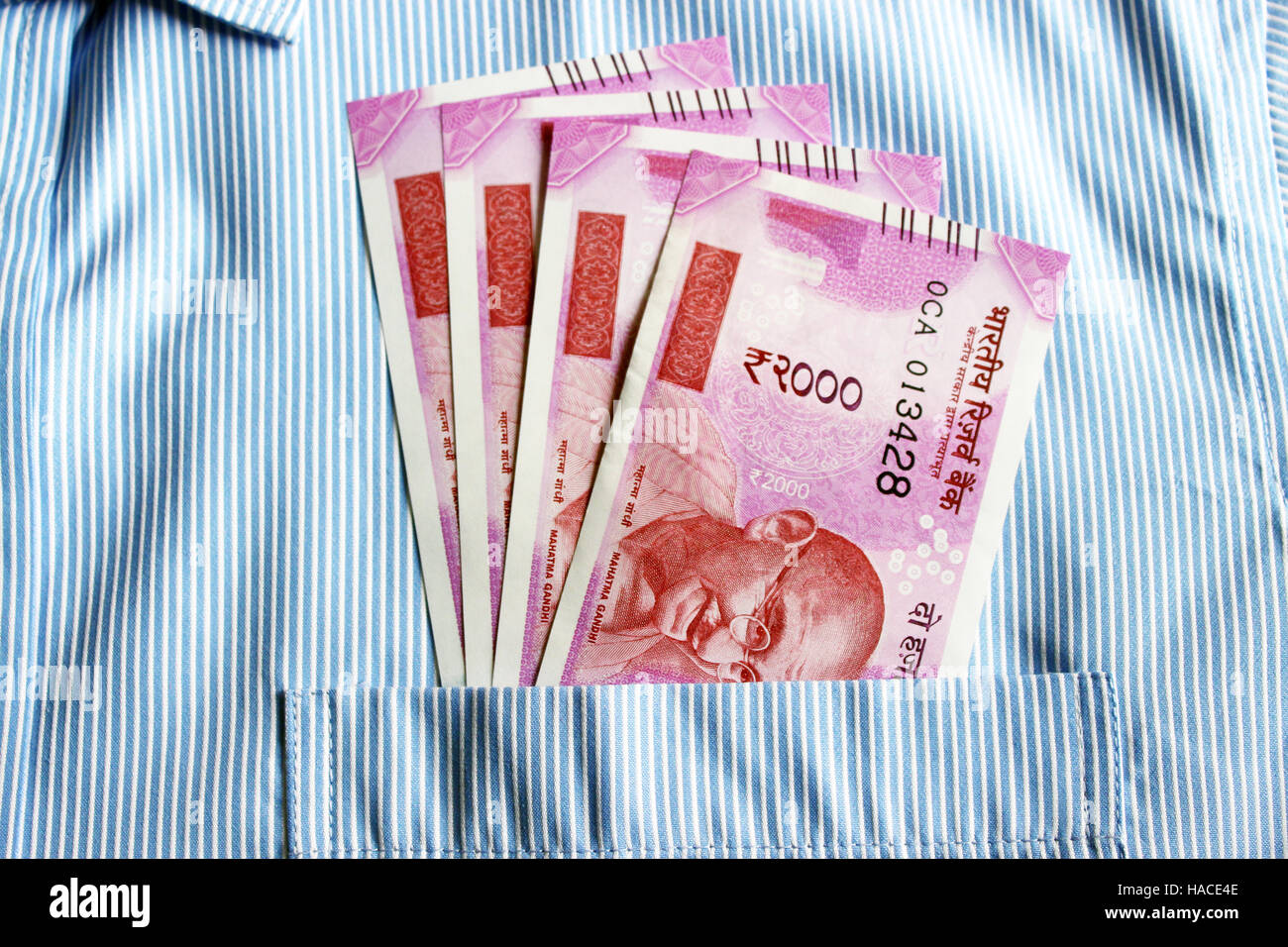 New 2000 rupee notes in an Indian men,s shirts front pocket Stock Photo ...