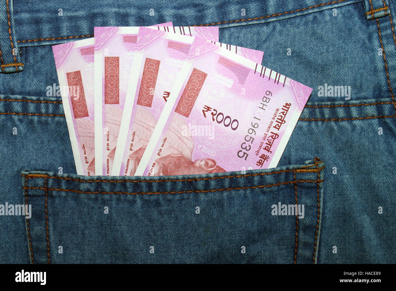 New 2000 rupee notes in an Indian mans jean back pocket Stock Photo - Alamy
