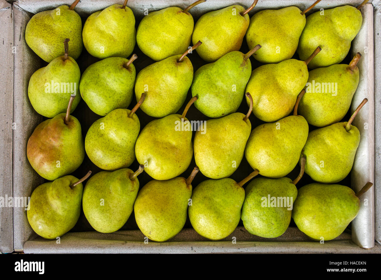 Tasty yellow pears in the box Stock Photo - Alamy