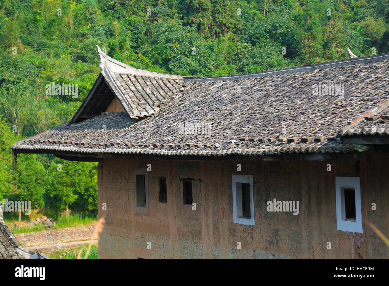 Classic roof top of a modern fujian earthen building (Tulou) community ...