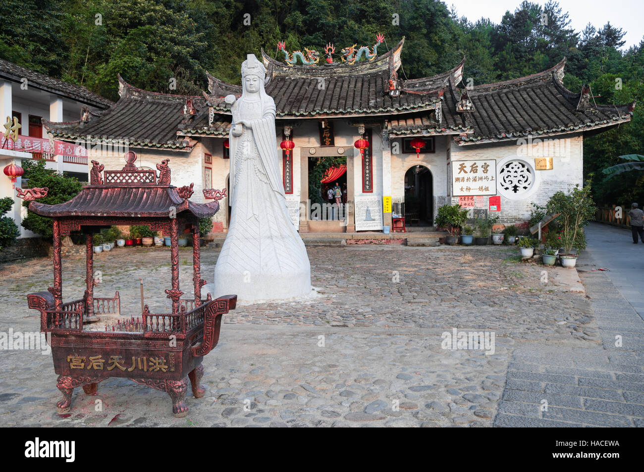 A chinese temple inside the Fujian Hakka earthen building (Tulou ...