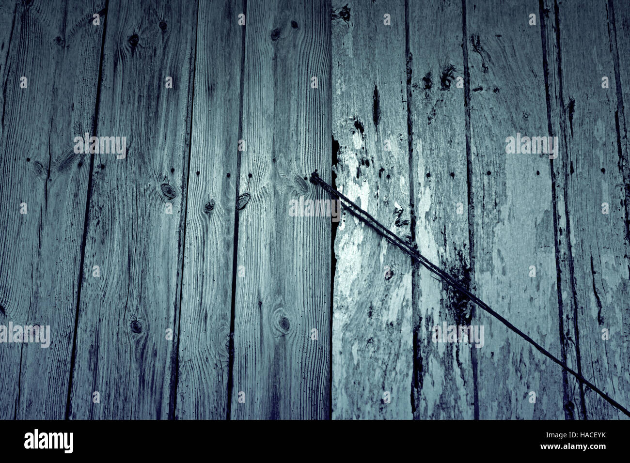 Scraped wooden door in urban building, construction Stock Photo - Alamy