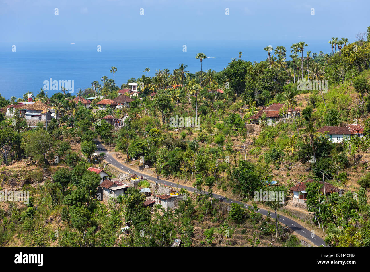 Aerial view of the coastal road on the East of Bali, Indonesia ...