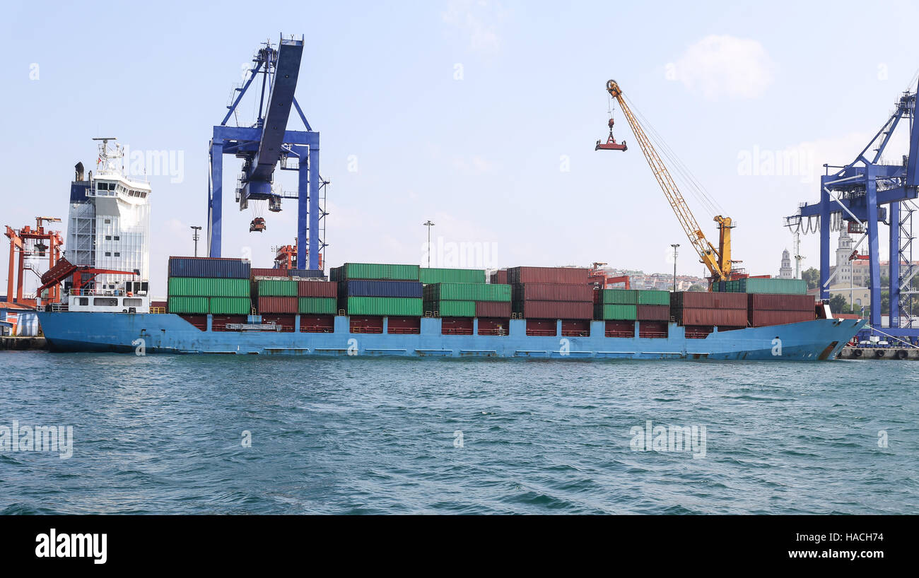 Container Ship is loading in a port Stock Photo - Alamy