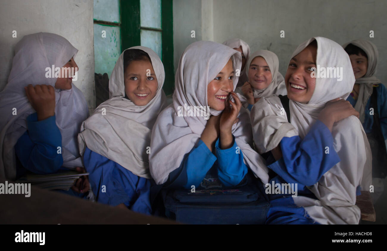 Muslim schoolgirls in hijab smiling in classroom in Hunza, northern ...