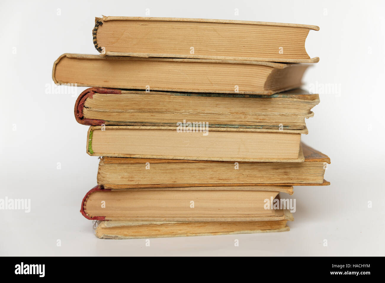 stack of old books isolated on white background Stock Photo - Alamy