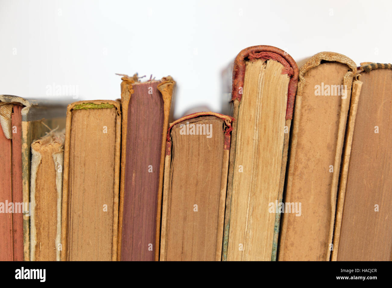 stack of old books isolated on white background Stock Photo - Alamy