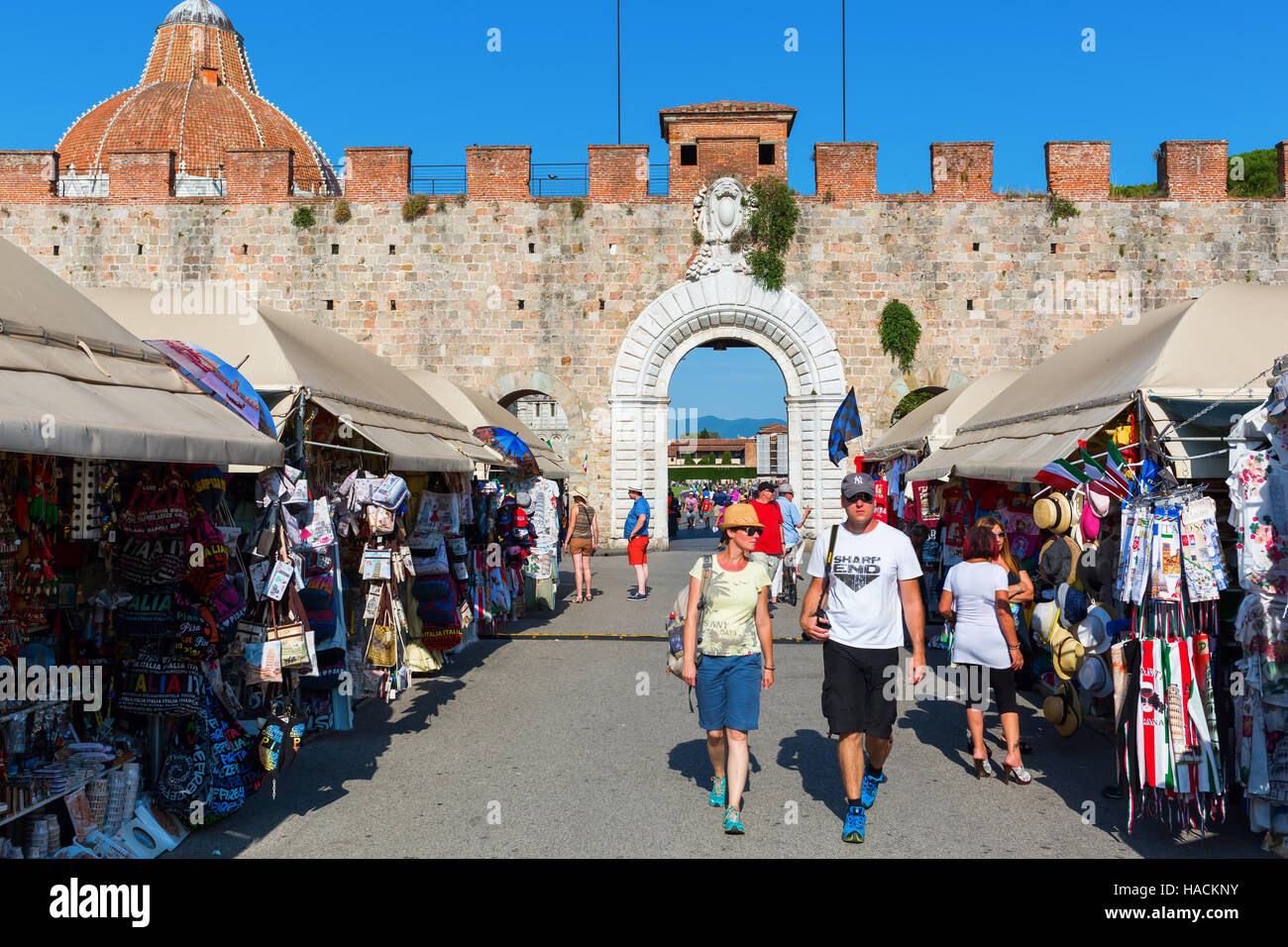 market in front of the historic city wall of Pisa, Italy Stock Photo ...