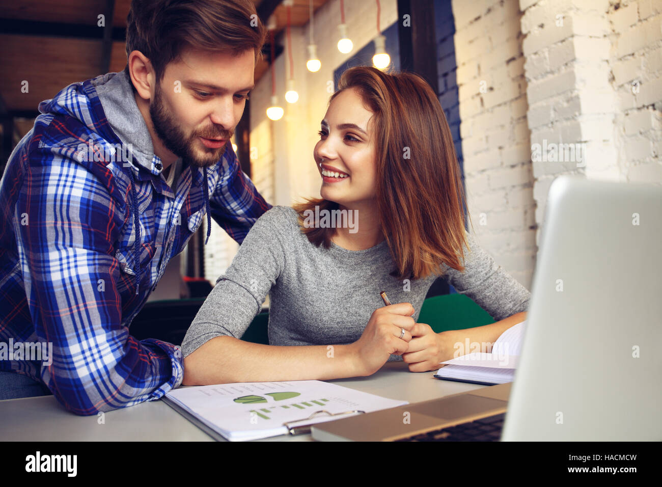 Young professionals work in modern office Stock Photo - Alamy