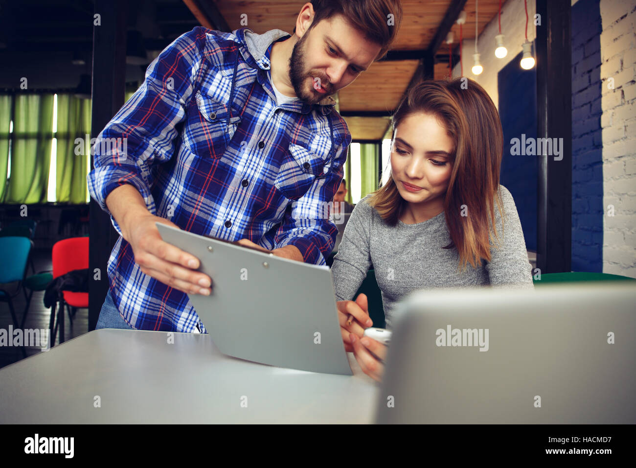 Young professionals work in modern office Stock Photo - Alamy